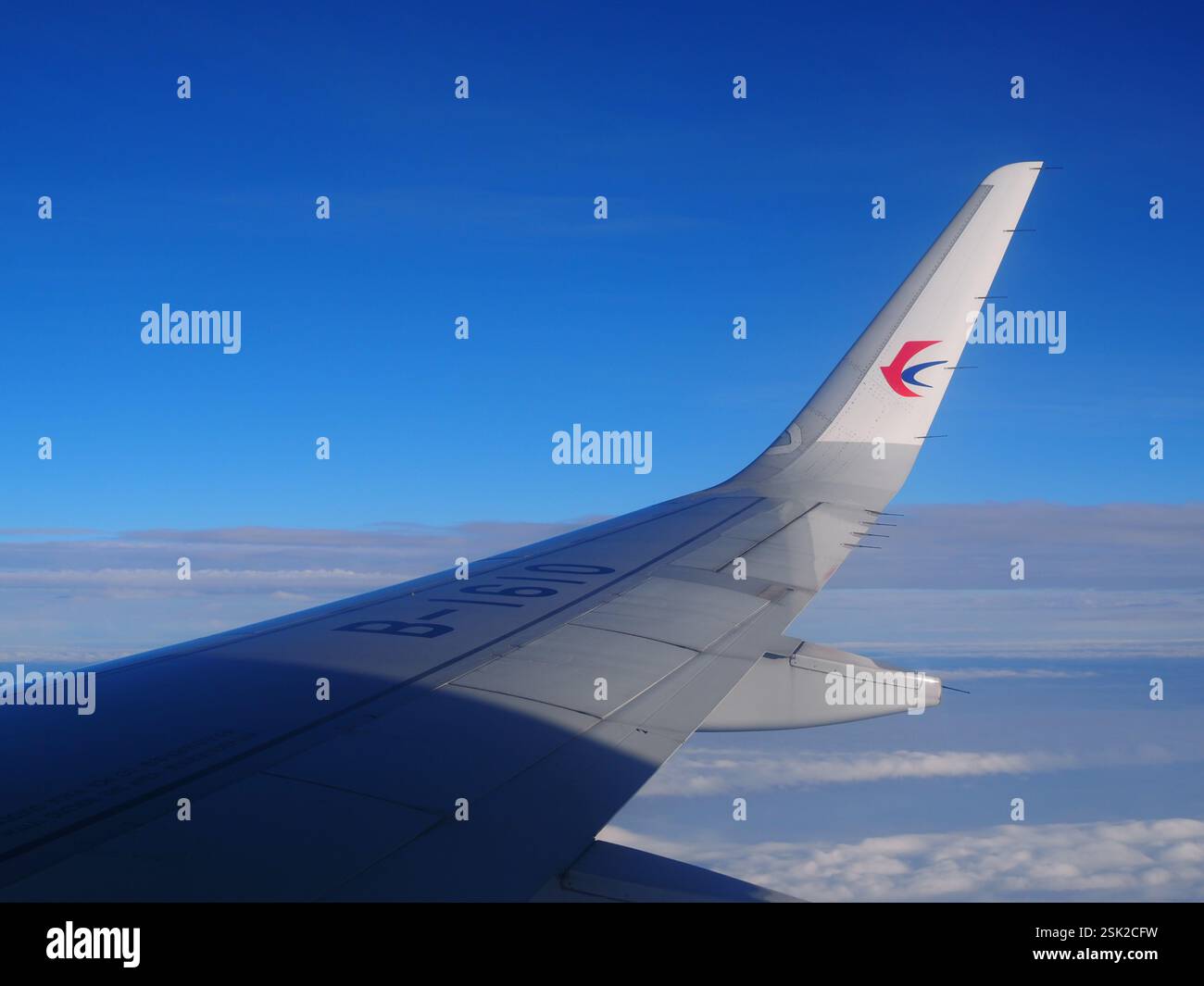 07 Oct 2024, Chongqing, China - Wing of a China Eastern Airline ...