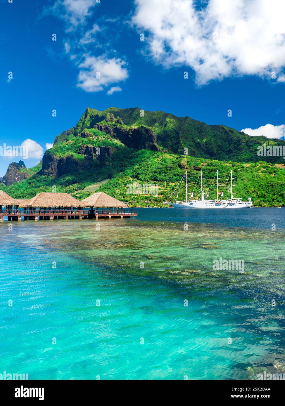 Sailing boat anchored in Moorea Stock Photo - Alamy