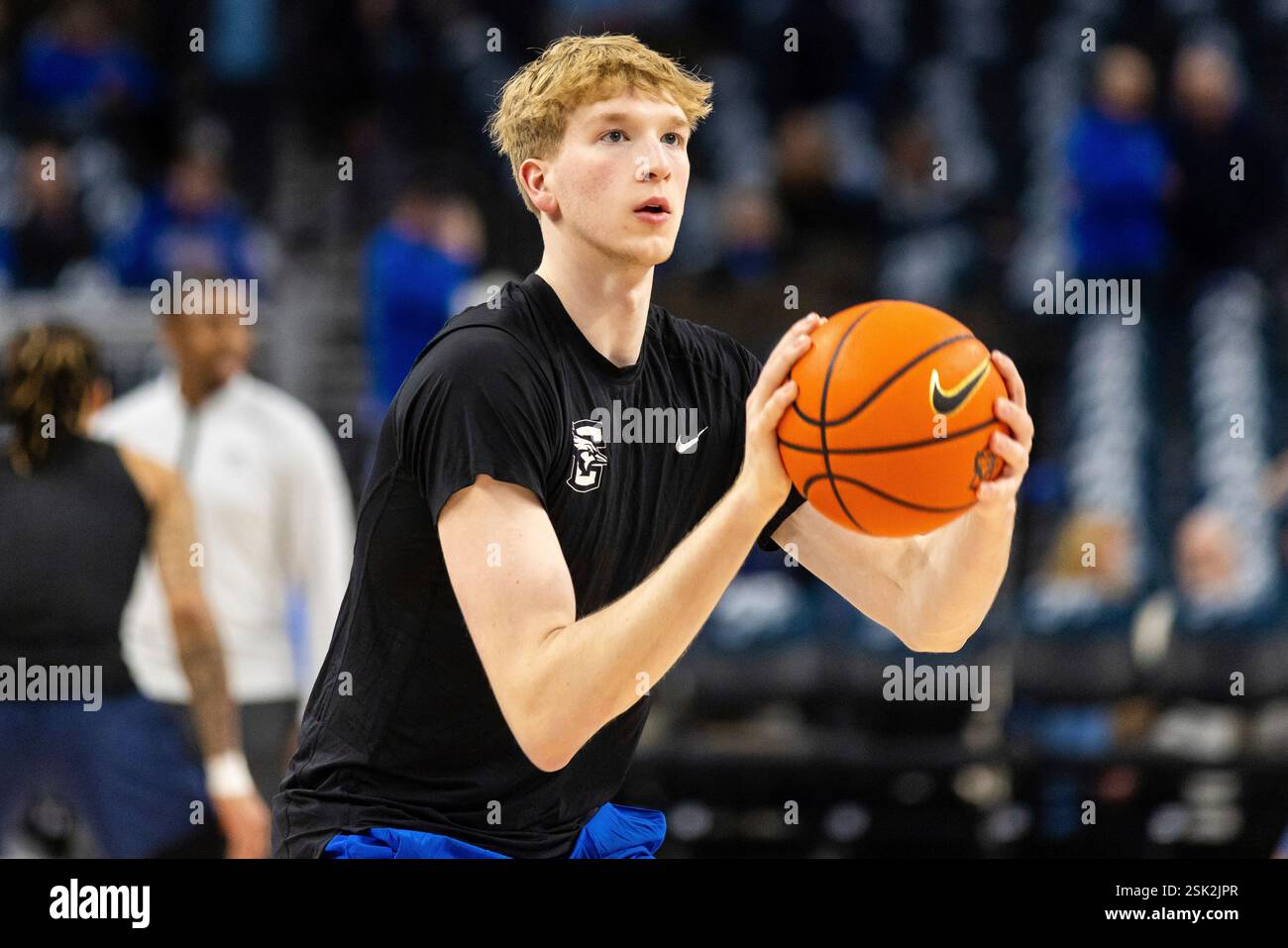 Creighton forward Jackson McAndrew (23) warms up before an NCAA college ...