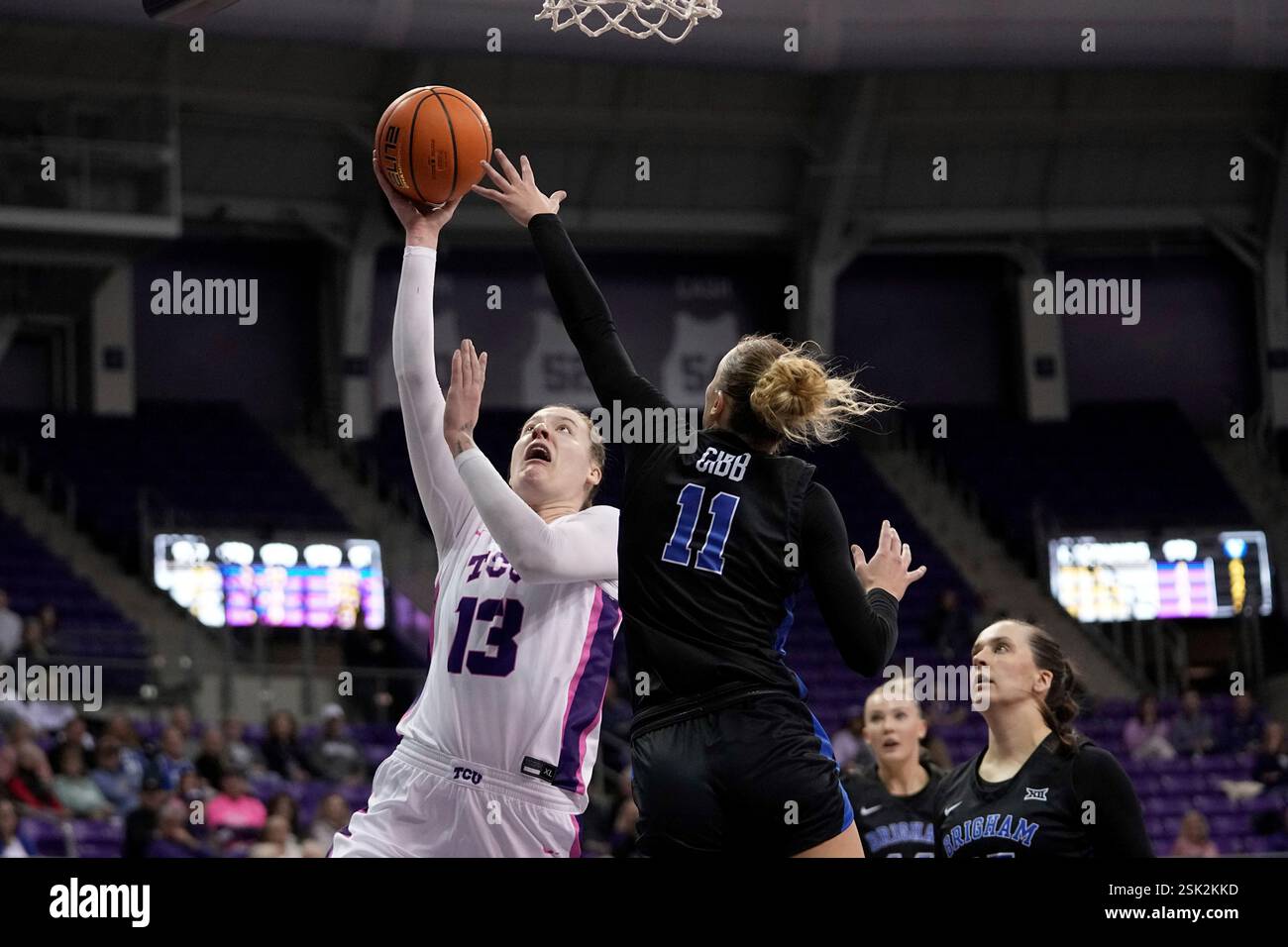 TCU center Sedona Prince (13) shoots as BYU's Delaney Gibb defends in ...