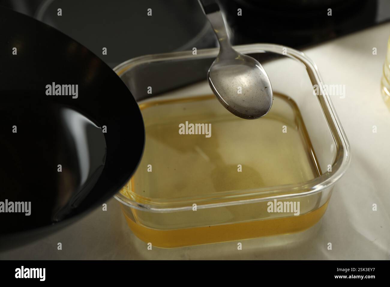 Pouring used cooking oil hi-res stock photography and images - Alamy