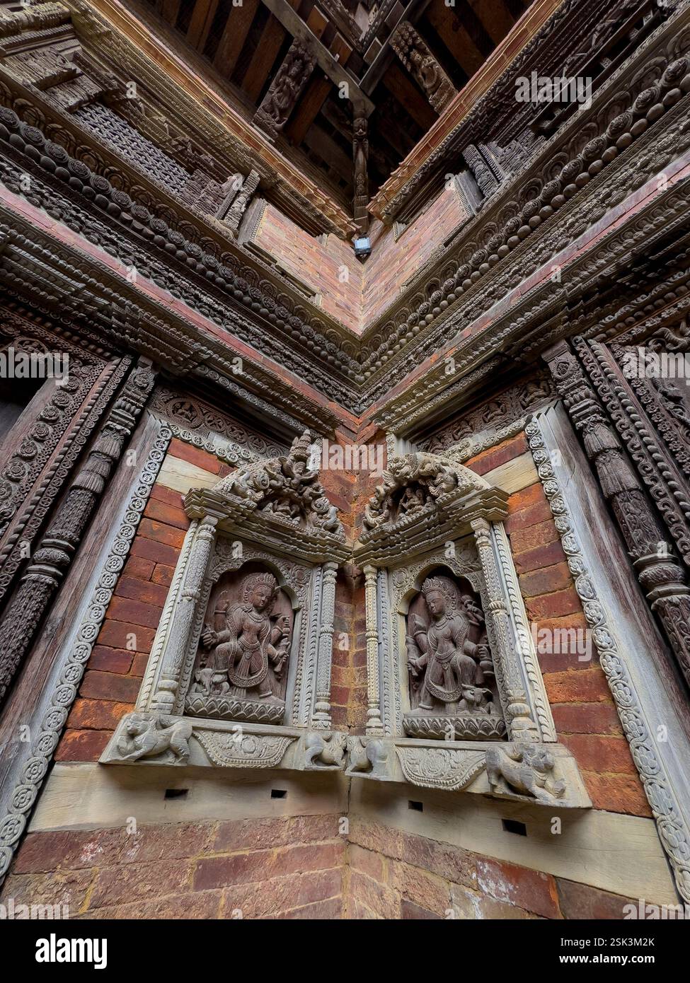 Wooden Newari deitys in the courtyard of Sundari Chowk of the Patan ...
