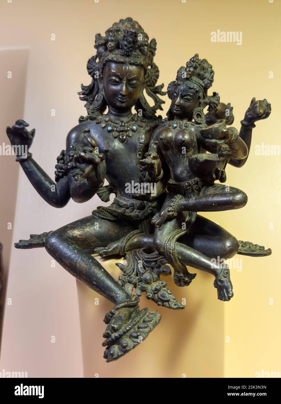 13th Century statue of Shiva and Parvati at the Patan Museum which is a ...