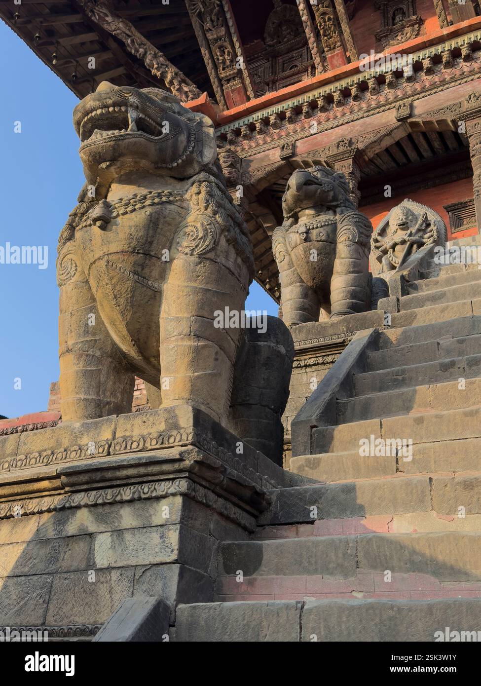 Stone Lions and Garuds guard the stairs of the Nyatapola Temple ...
