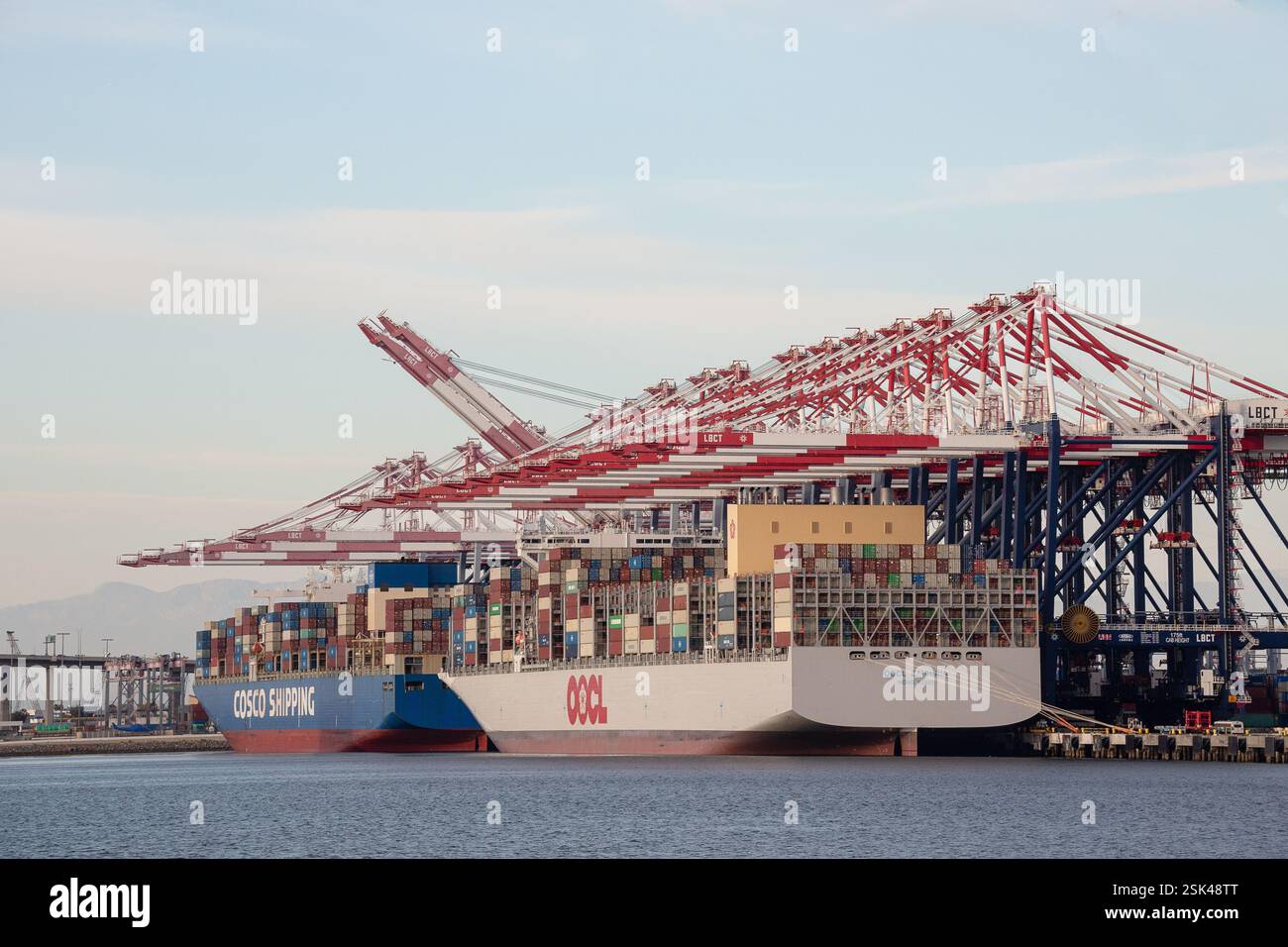 Cosco shipping container ship loading and unloading hi-res stock ...