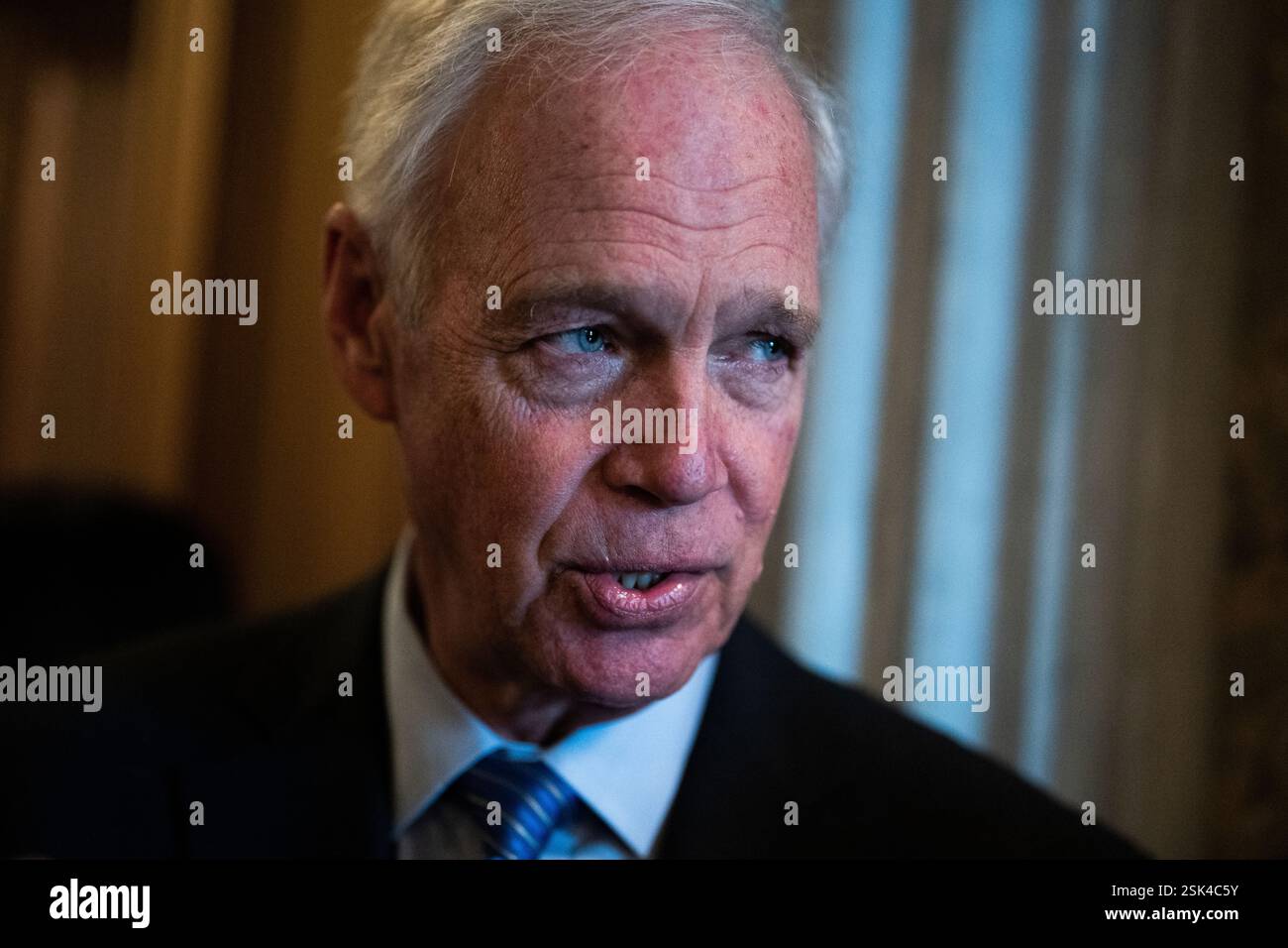 UNITED STATES - FEBRUARY 11: Sen. Ron Johnson, R-Wis., talks with ...
