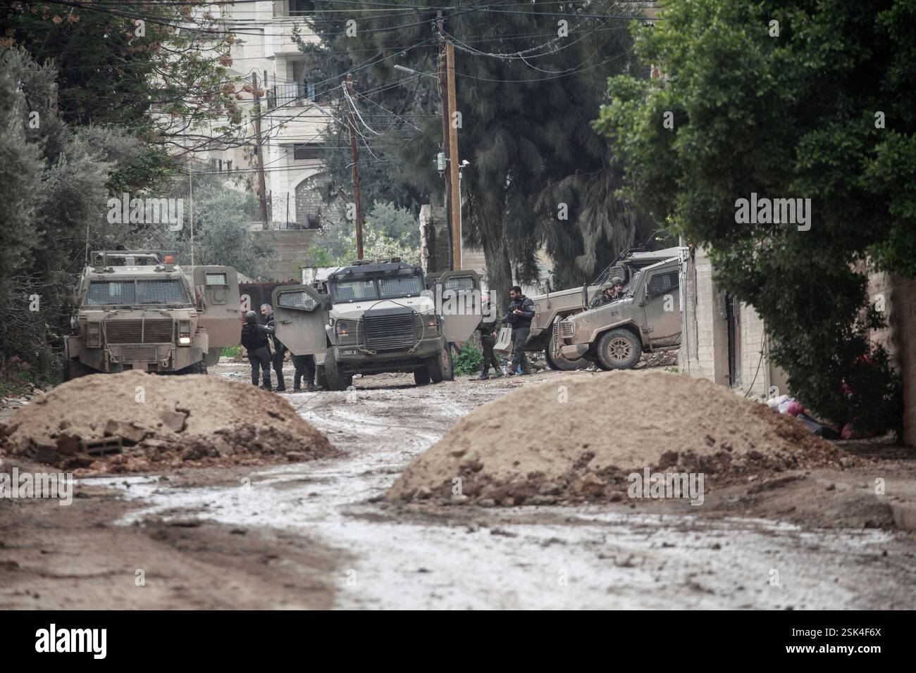 Jenin, Palestine. 11th Feb, 2025. Israeli military vehicles close the ...