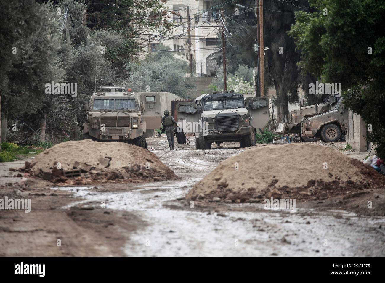 Jenin, Palestine. 11th Feb, 2025. Israeli military vehicles close the ...