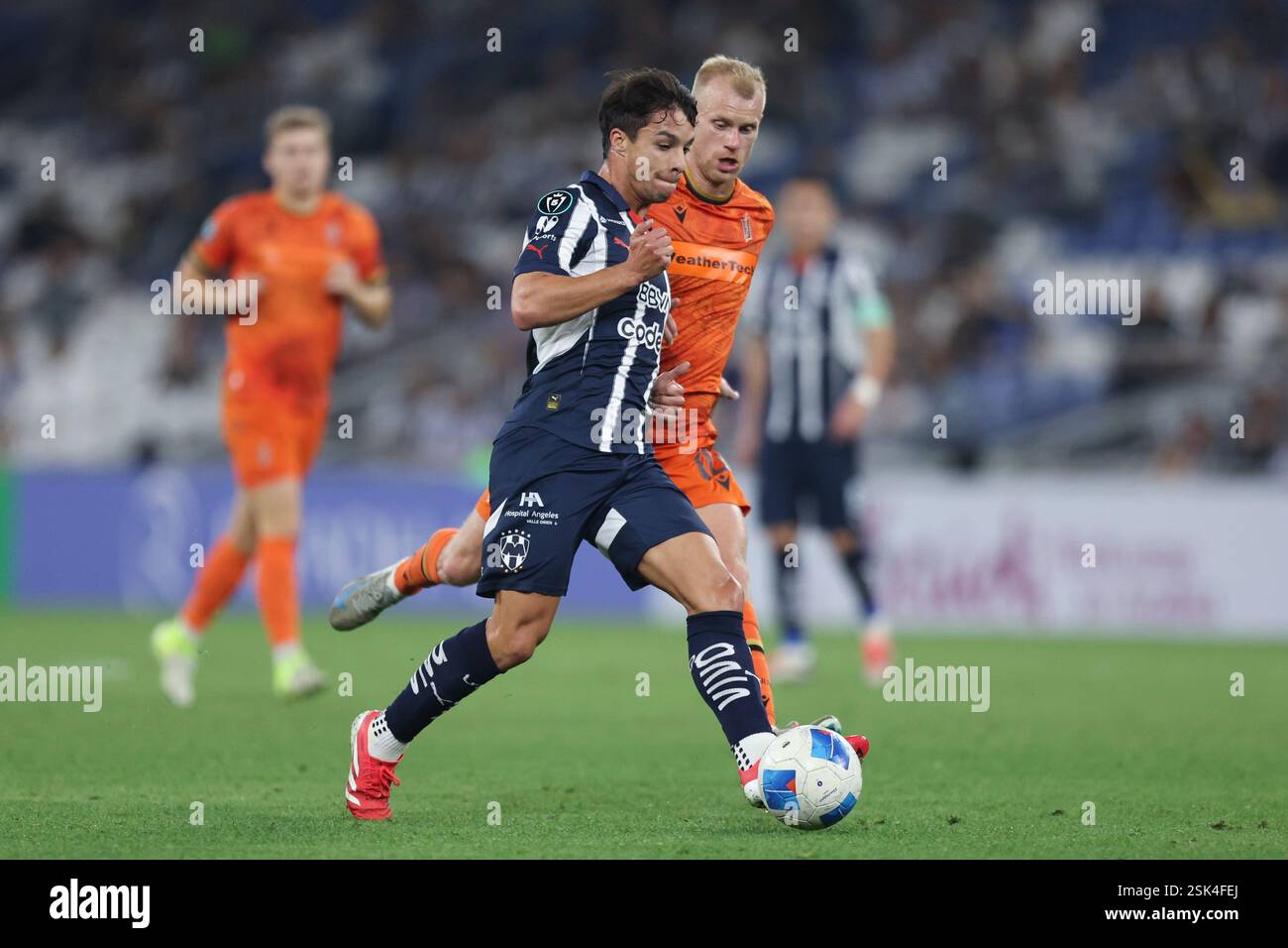Monterrey's Oliver Torres carries the ball followed by Forge FC's Kyle ...