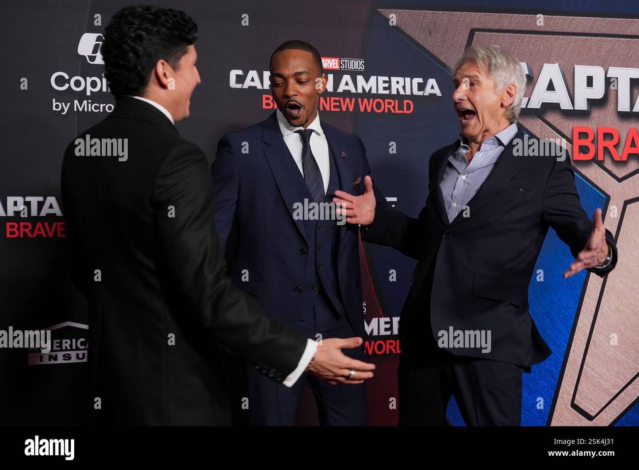 Danny Ramirez, from left, Anthony Mackie, and Harrison Ford arrive at ...