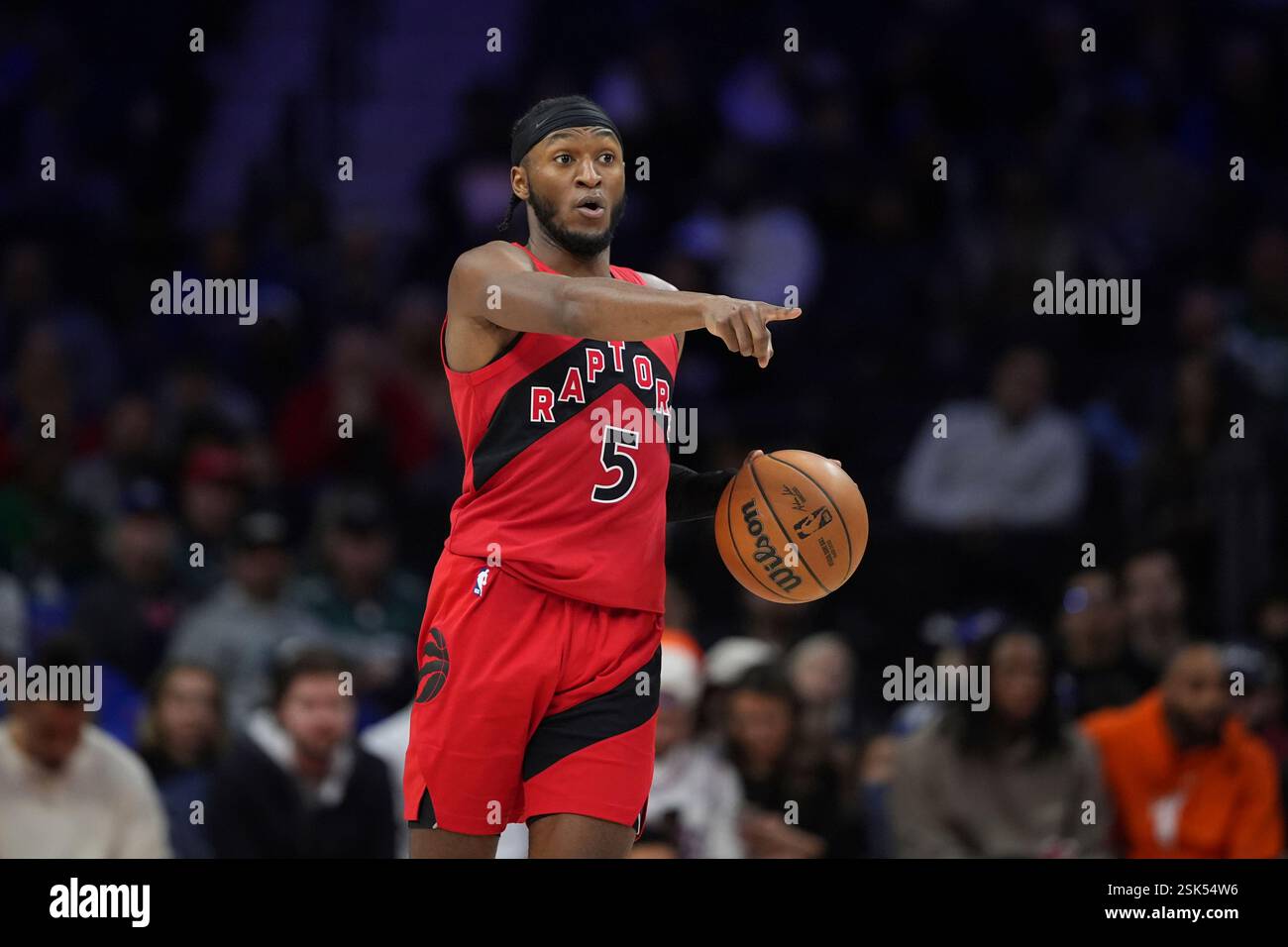 Toronto Raptors' Immanuel Quickley plays during an NBA basketball game ...