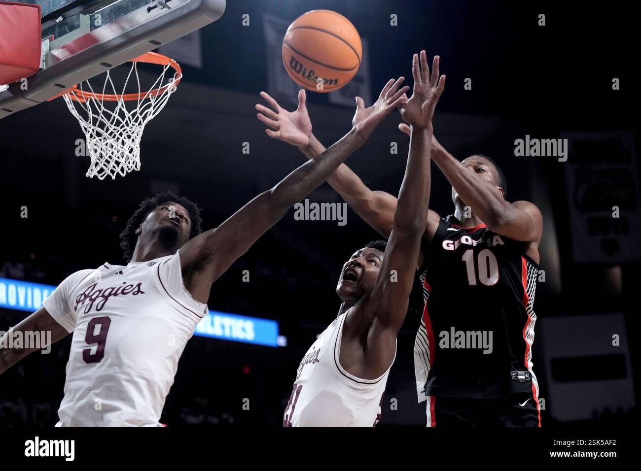Texas A&M forward Solomon Washington, left, and teammate Pharrel Payne ...