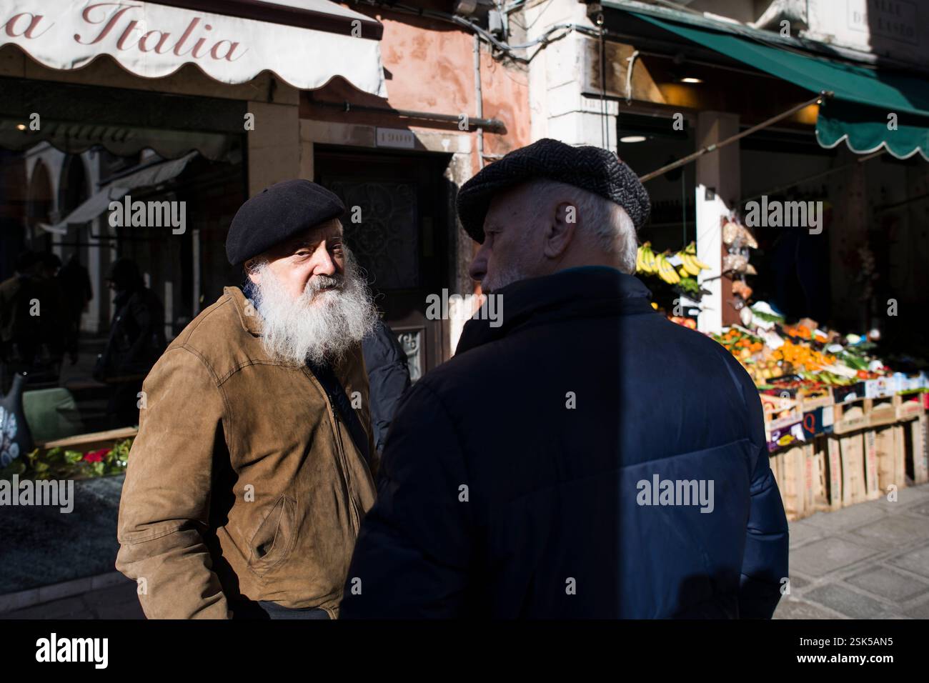 Venice, Italy. 3rd Feb, 2025. Local residents chat on the street in ...