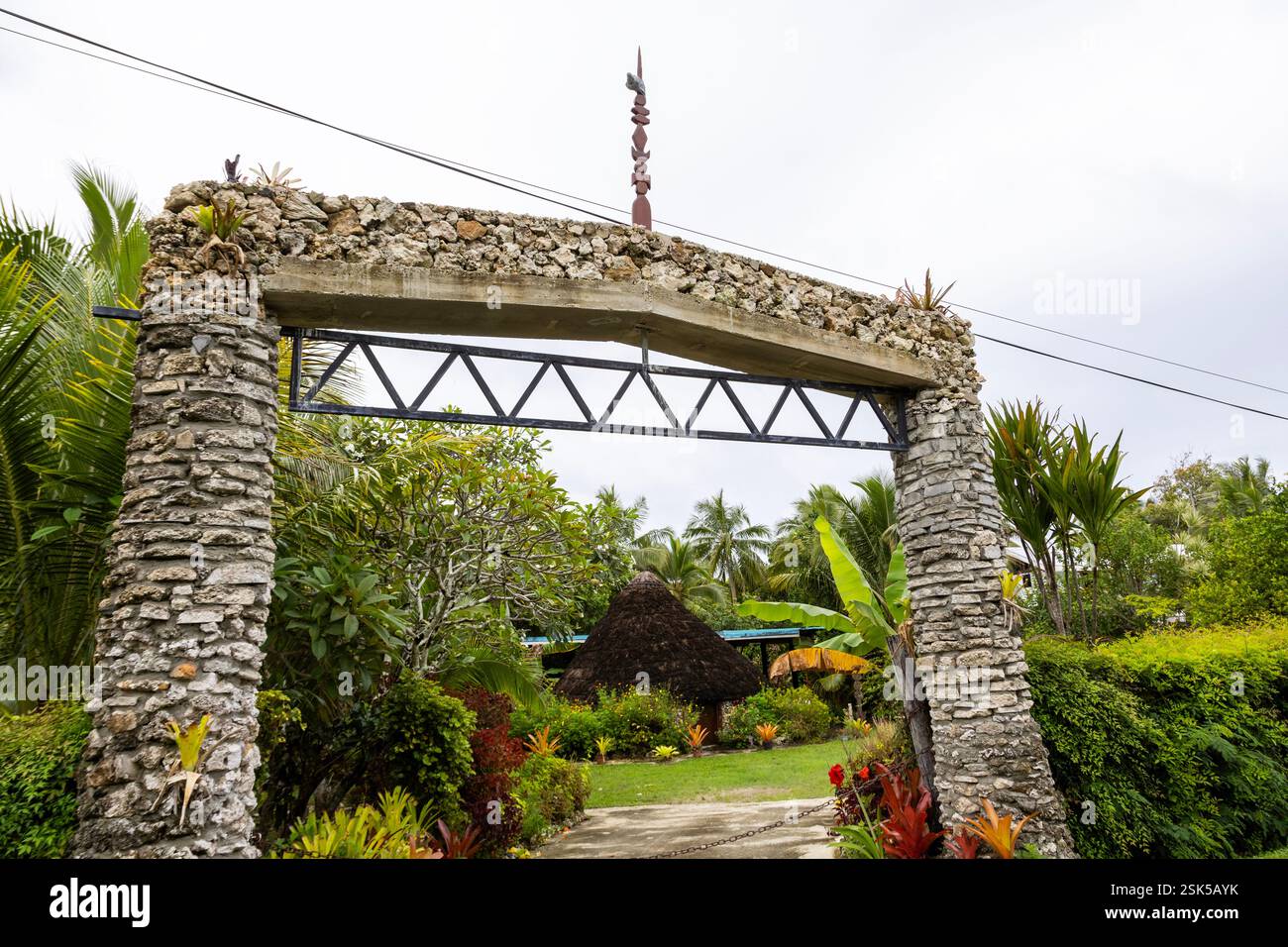 Arch entrance to a traditional hut in Easo, Lifou Island, Loyalty ...