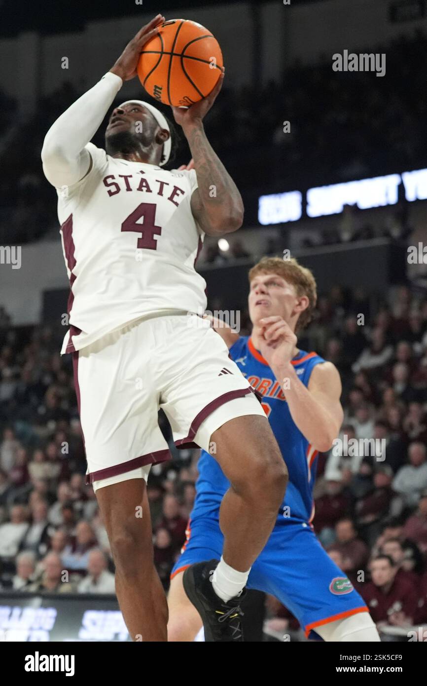 Mississippi State forward Cameron Matthews (4) attempts a layup while ...