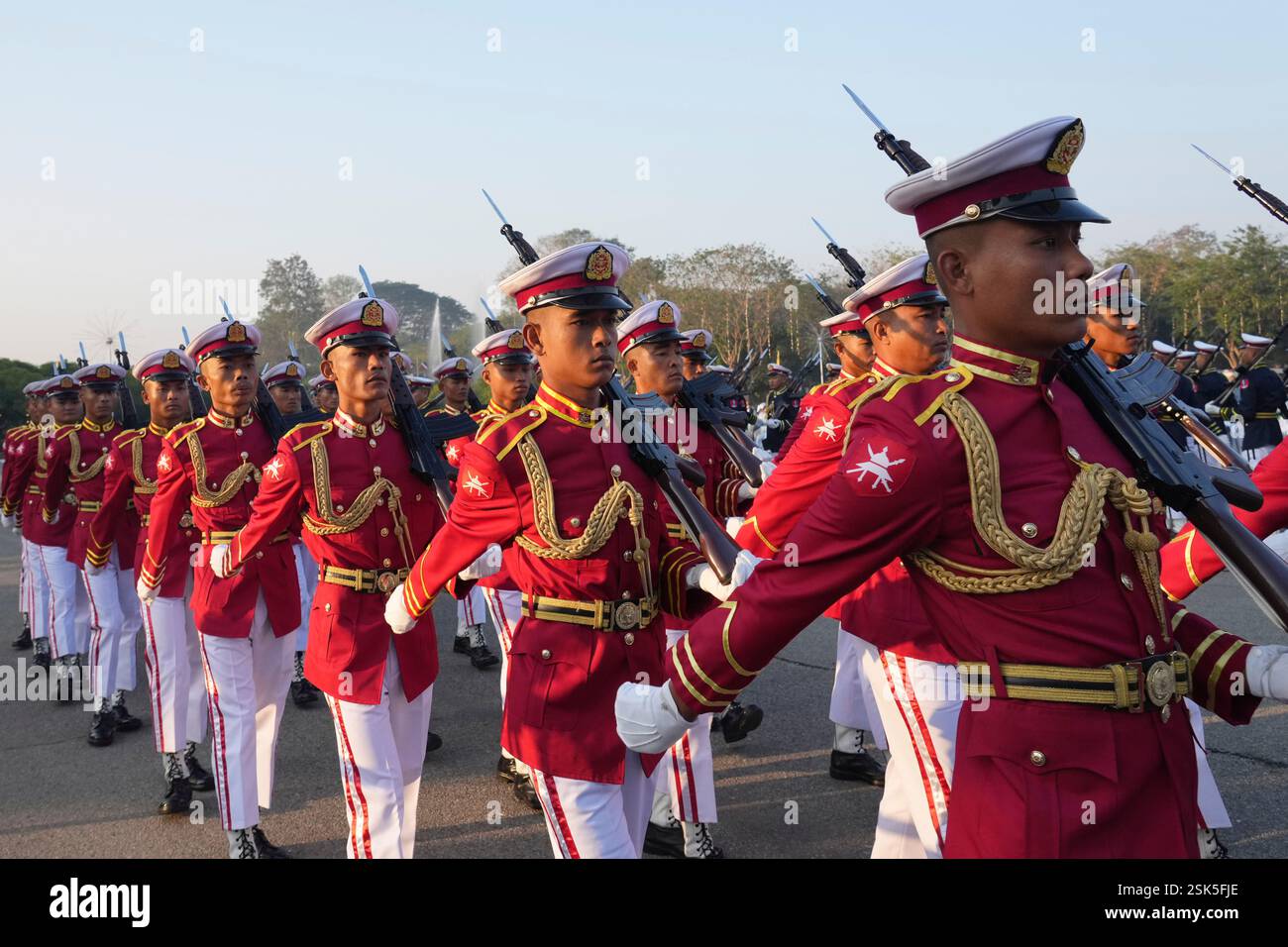Members of an honor guard leave after a ceremony to mark Myanmar's 78th ...