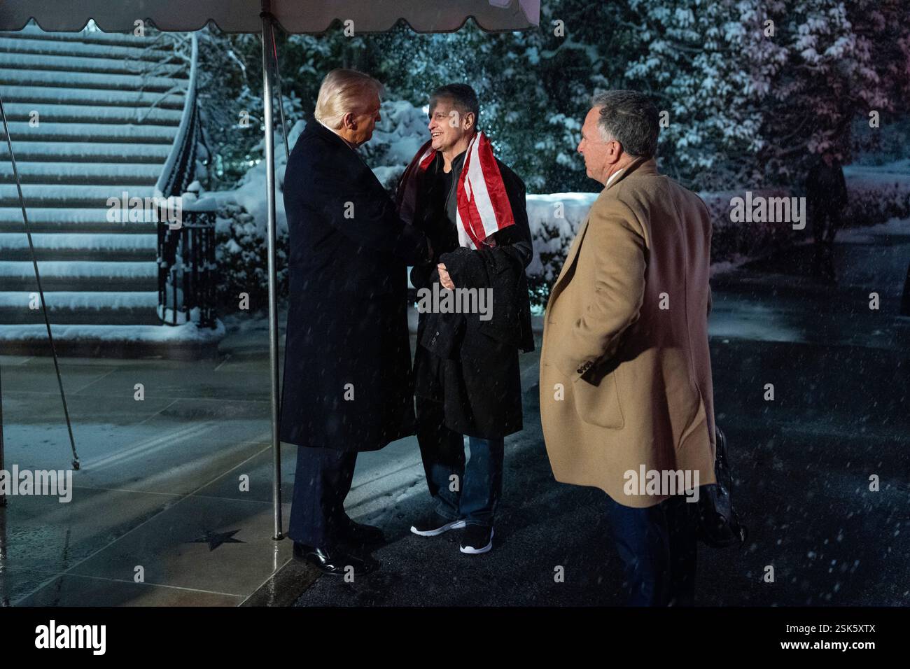 President Donald Trump, greets Marc Fogel at the White House, Tuesday ...