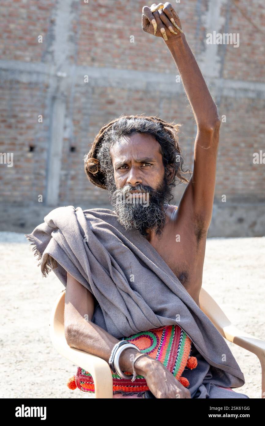 indian hindu sage with raised left hand in spiritual practice since ...