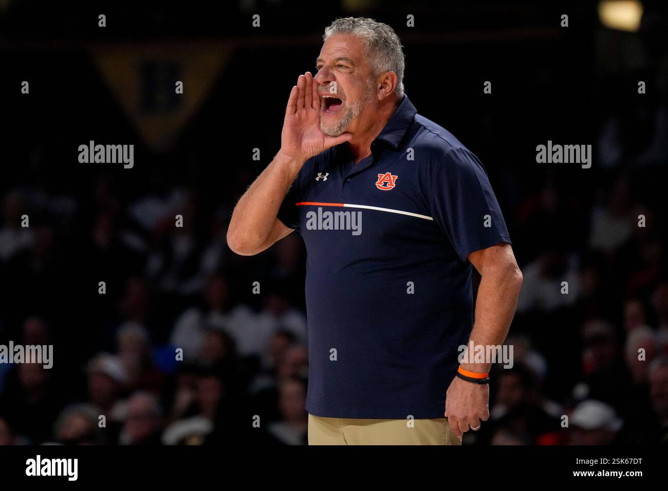Auburn head coach Bruce Pearl yells to his players during the first ...