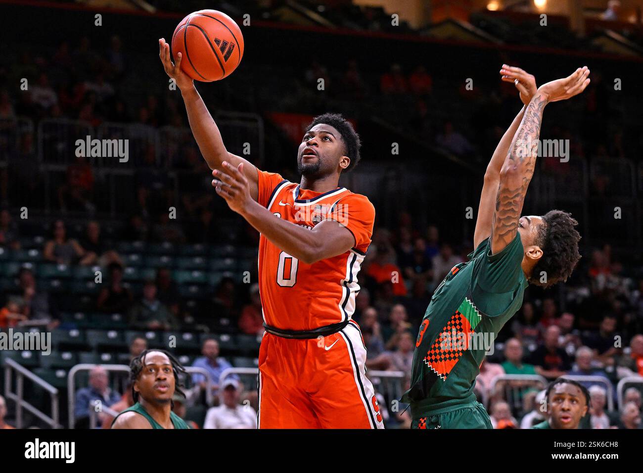CORAL GABLES, FL - FEBRUARY 11: Syracuse guard Kyle Cuffe Jr. (0) puts ...