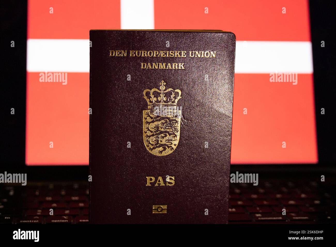 In this photo illustration, a view of a biometric Danish passport with ...