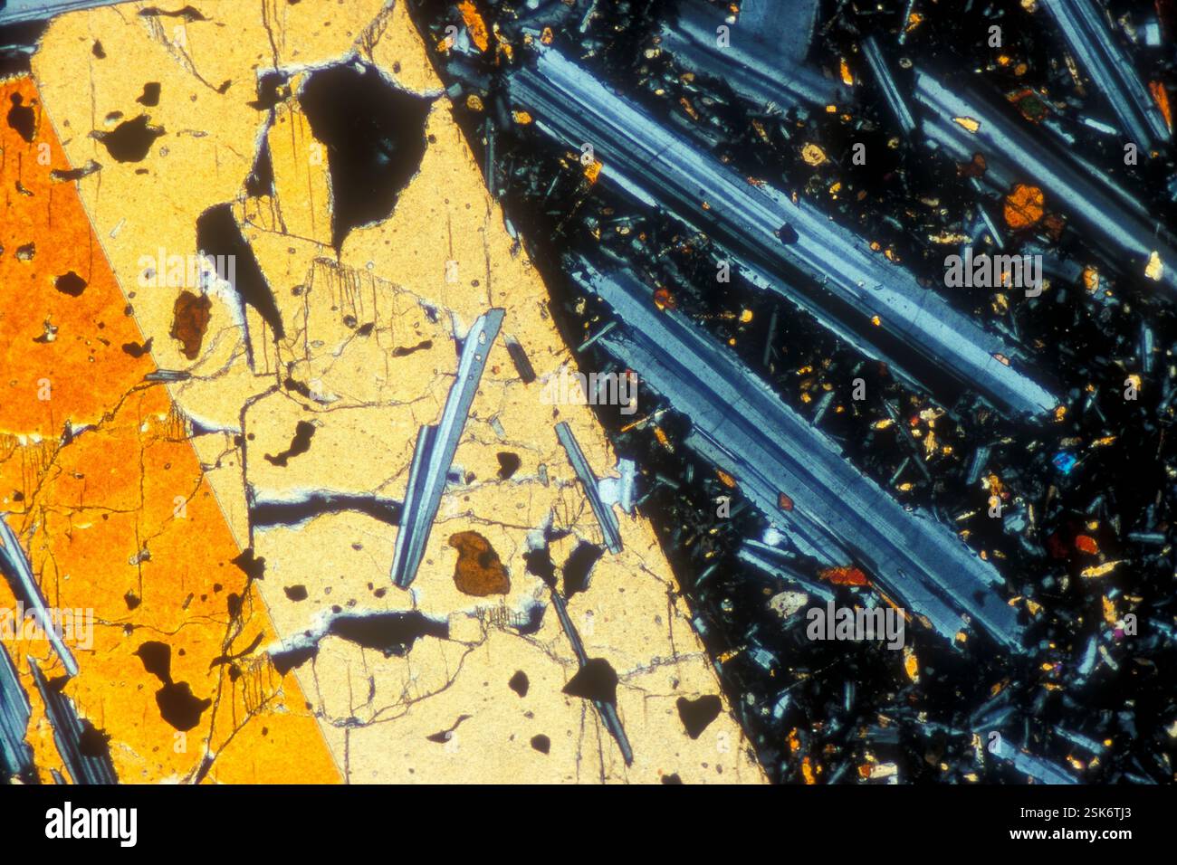 Basalt rock crystals. Polarised light micrograph of a sample of basalt ...