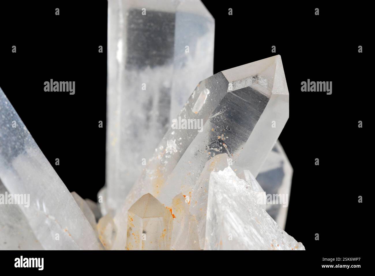 Quartz crystals. Quartz (silicon dioxide) is the most abundant mineral in the Earth's ...