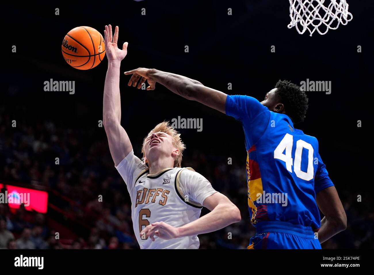 Kansas forward Flory Bidunga (40) blocks a shot by Colorado forward ...