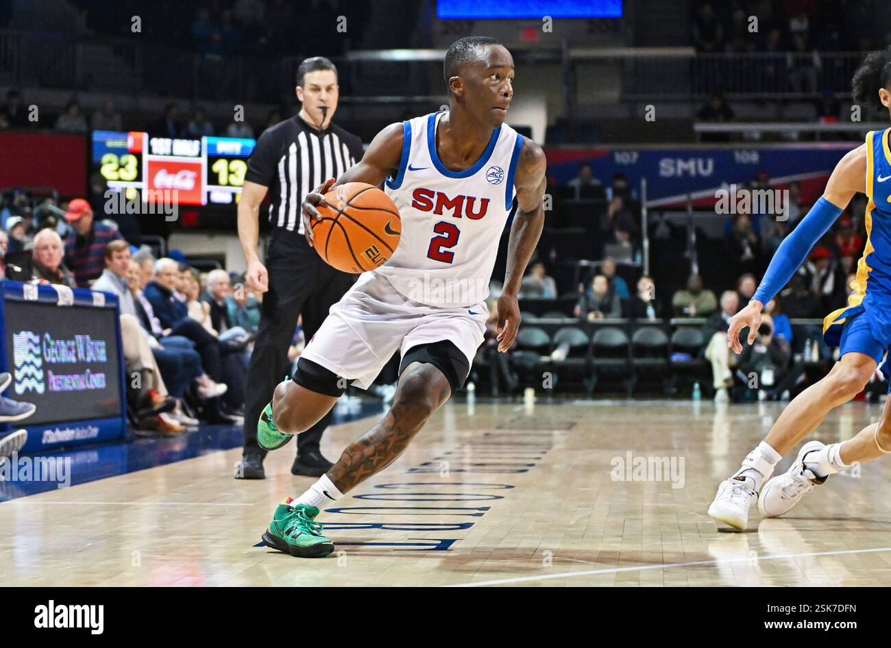 February11, 2025: SMU Mustangs guard Kevin Miller drives towards the ...