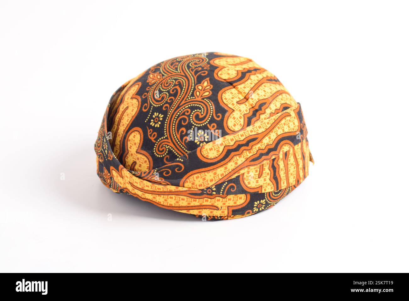 Blangkon, a traditional Javanese men's head covering made of batik ...