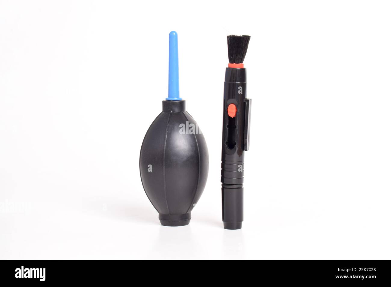 Cleaning set for camera. Air blower and brush isolated on white ...