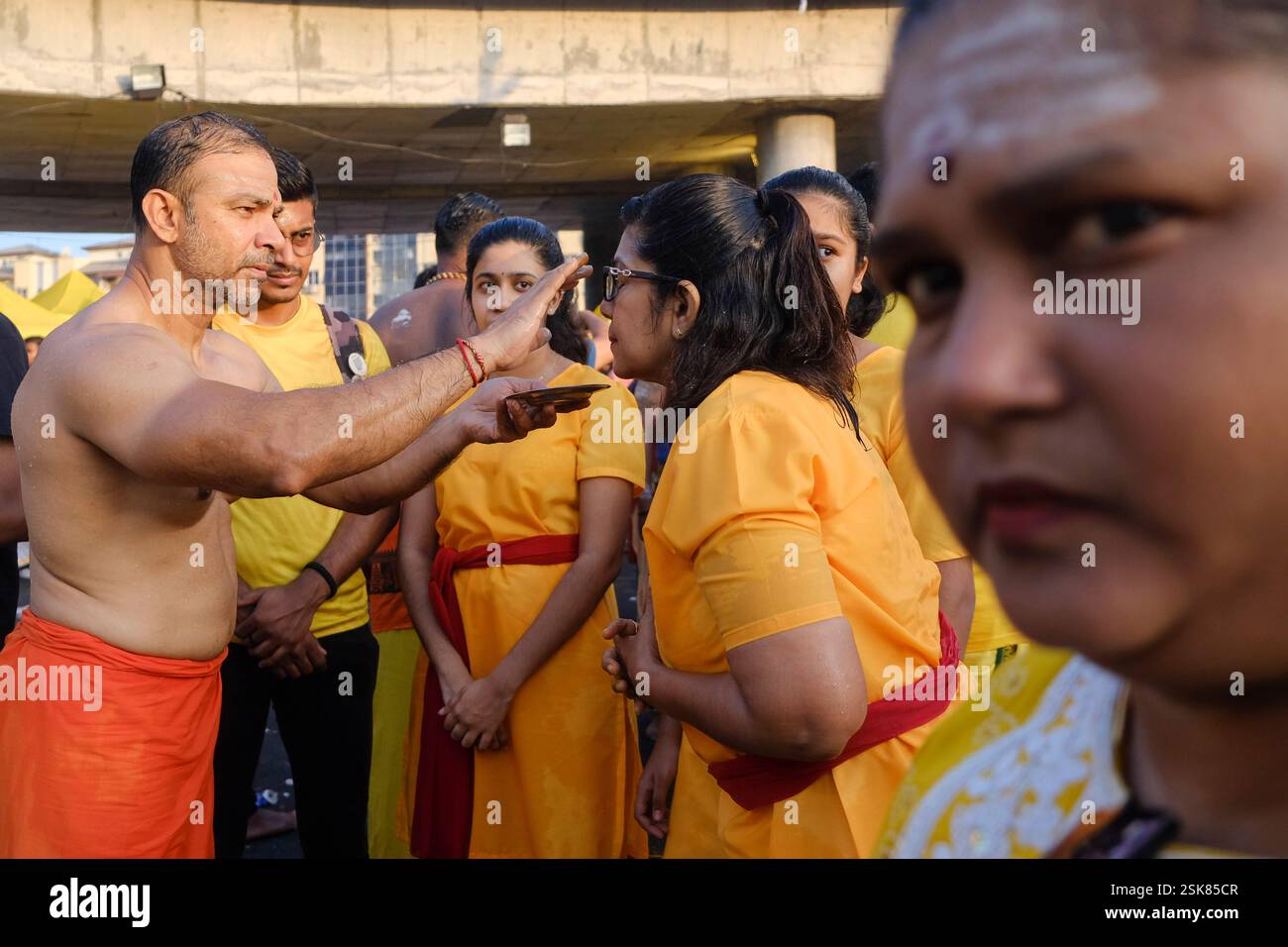 Kuala Lumpur, Malaysia. 11th Feb, 2025. A Hindu devotee family seen get ...