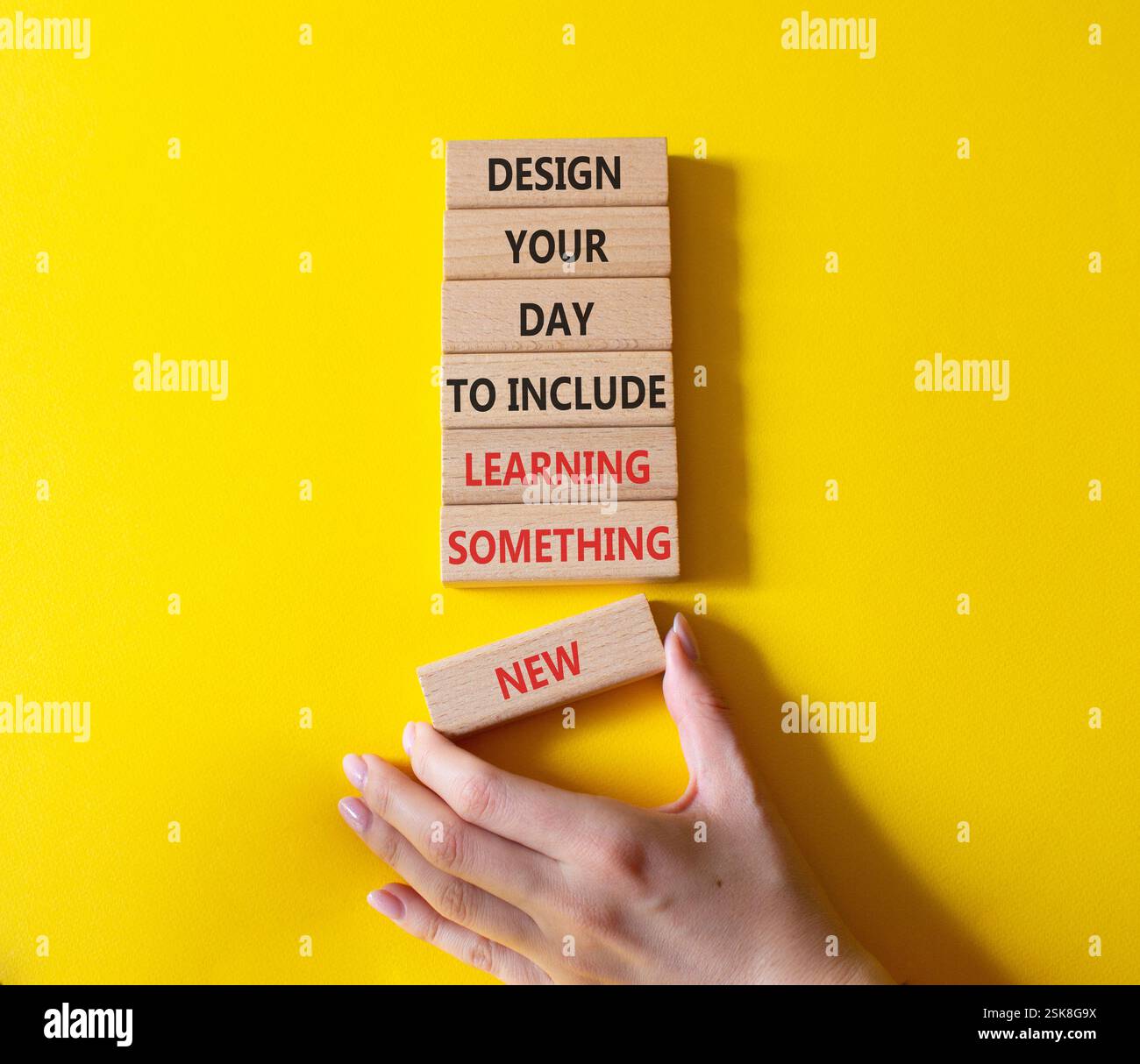 Learning symbol. Wooden blocks with words Design your day to learn ...