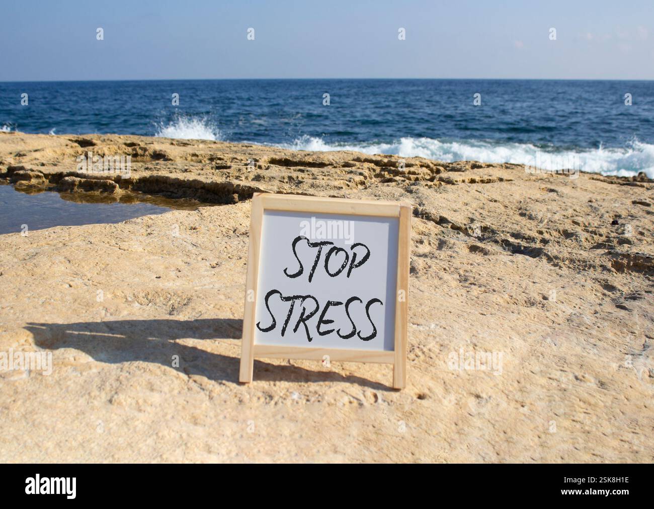 Stop Stress symbol. Concept words Stop Stress on white chalk background ...