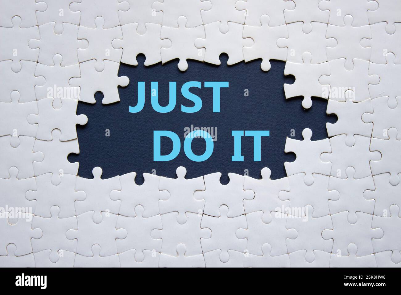 Just do it symbol. Concept words Just do it on white puzzle. Beautiful ...
