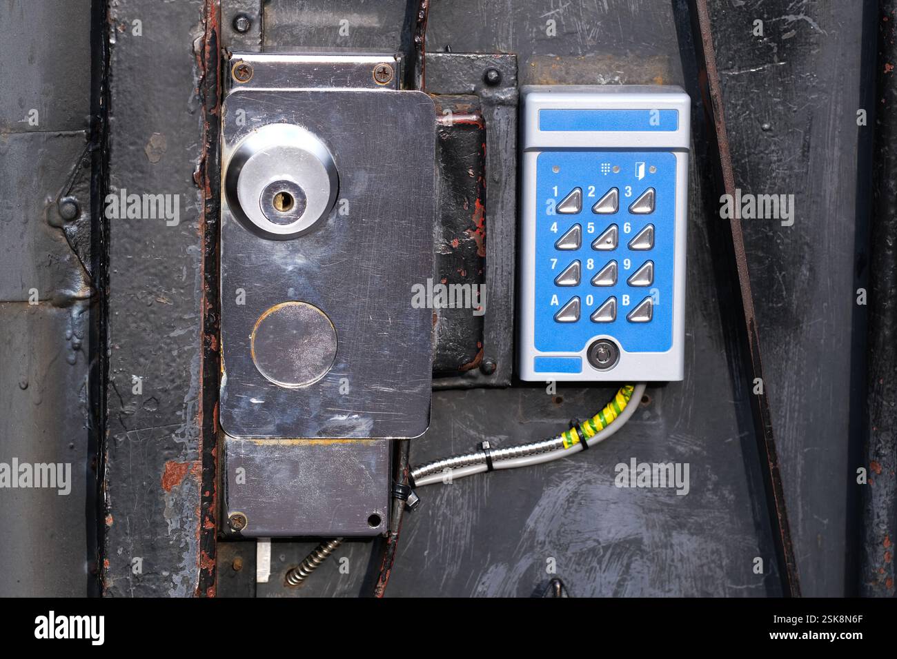 Number combination lock on a door Stock Photo - Alamy