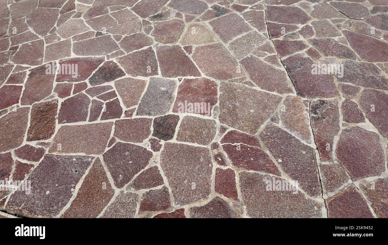 Stone pathway design with various textures and colors in sunlight Stock ...