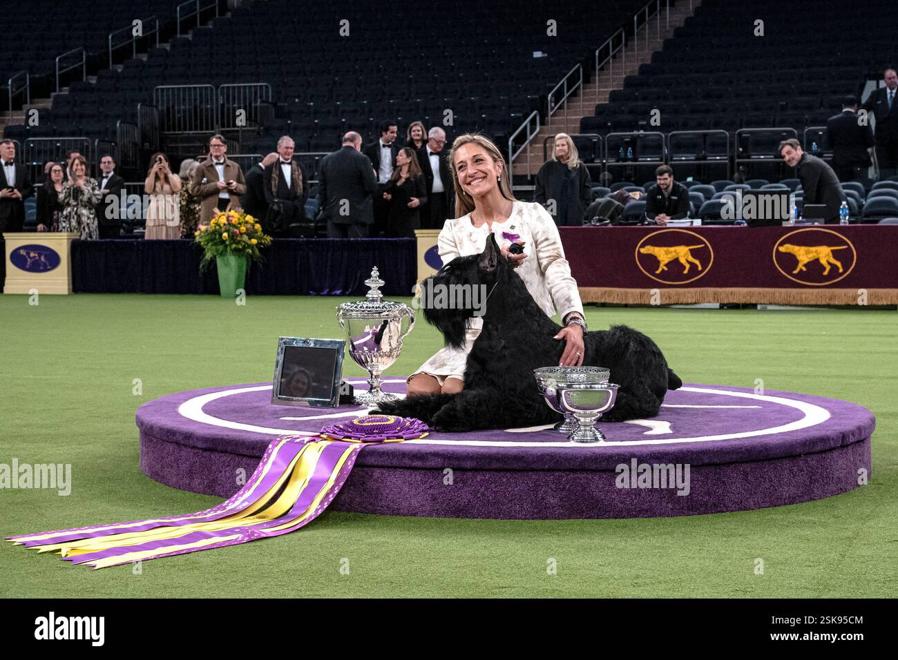 Monty, the Giant Schnauzer wins Best in Show with handler Kate Bernadin ...