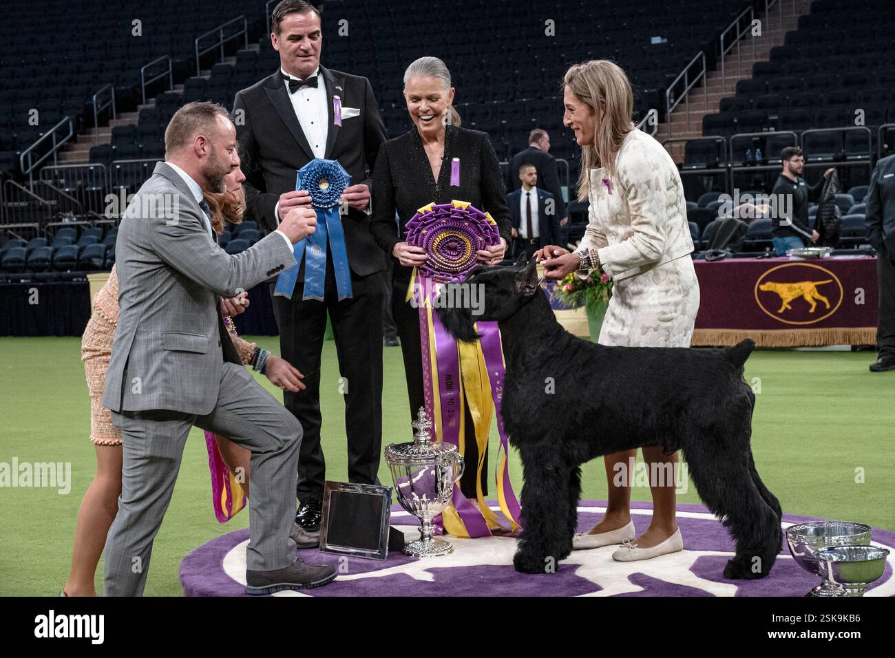 Monty, the Giant Schnauzer wins Best in Show with handler Kate Bernadin ...