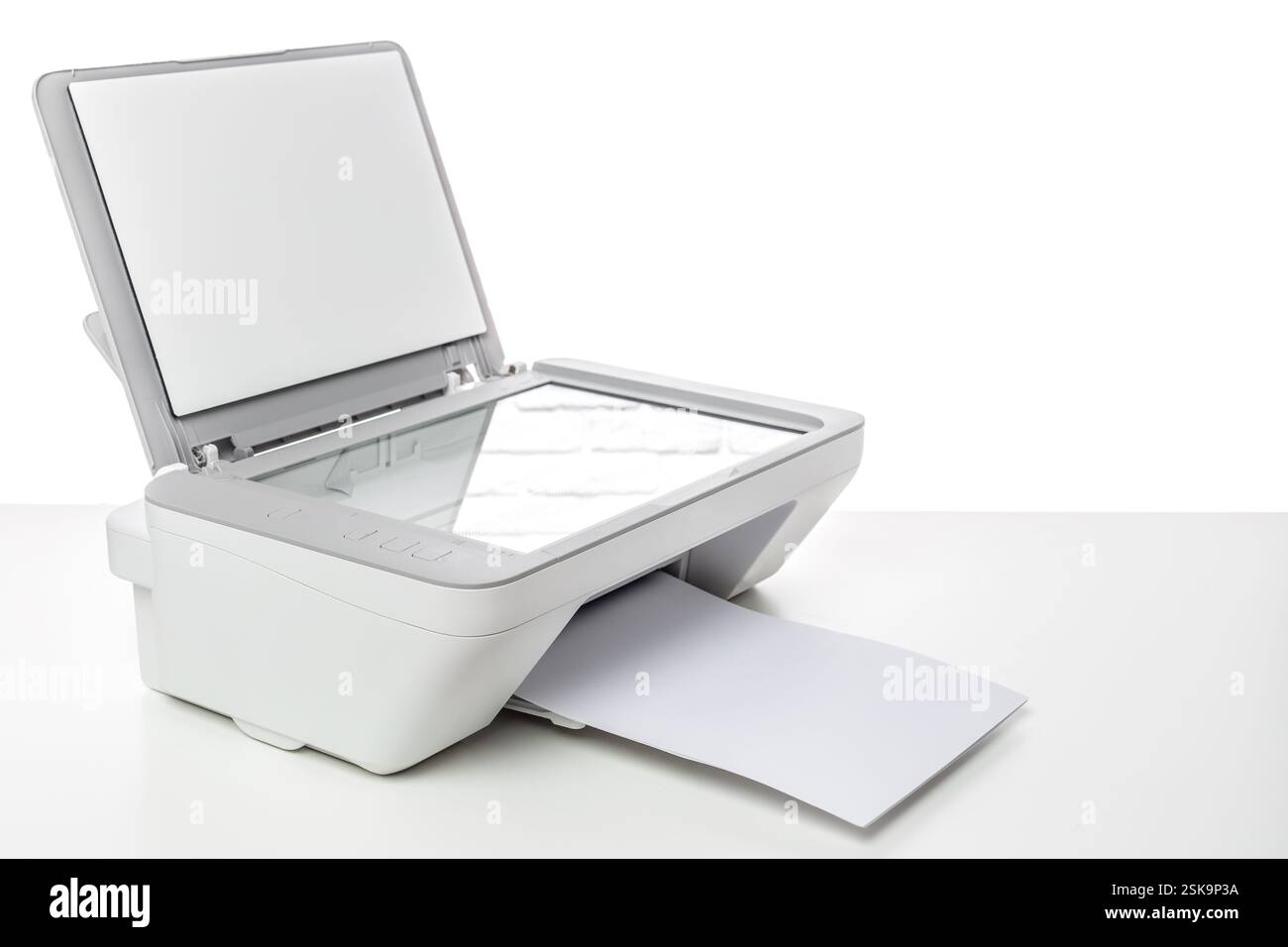 Office printer with scanning function sitting on a desk ready for use ...