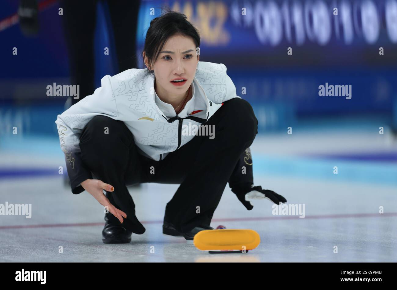 Harbin, China's Heilongjiang Province. 12th Feb, 2025. Jiang Jiayi of China reacts during the ...