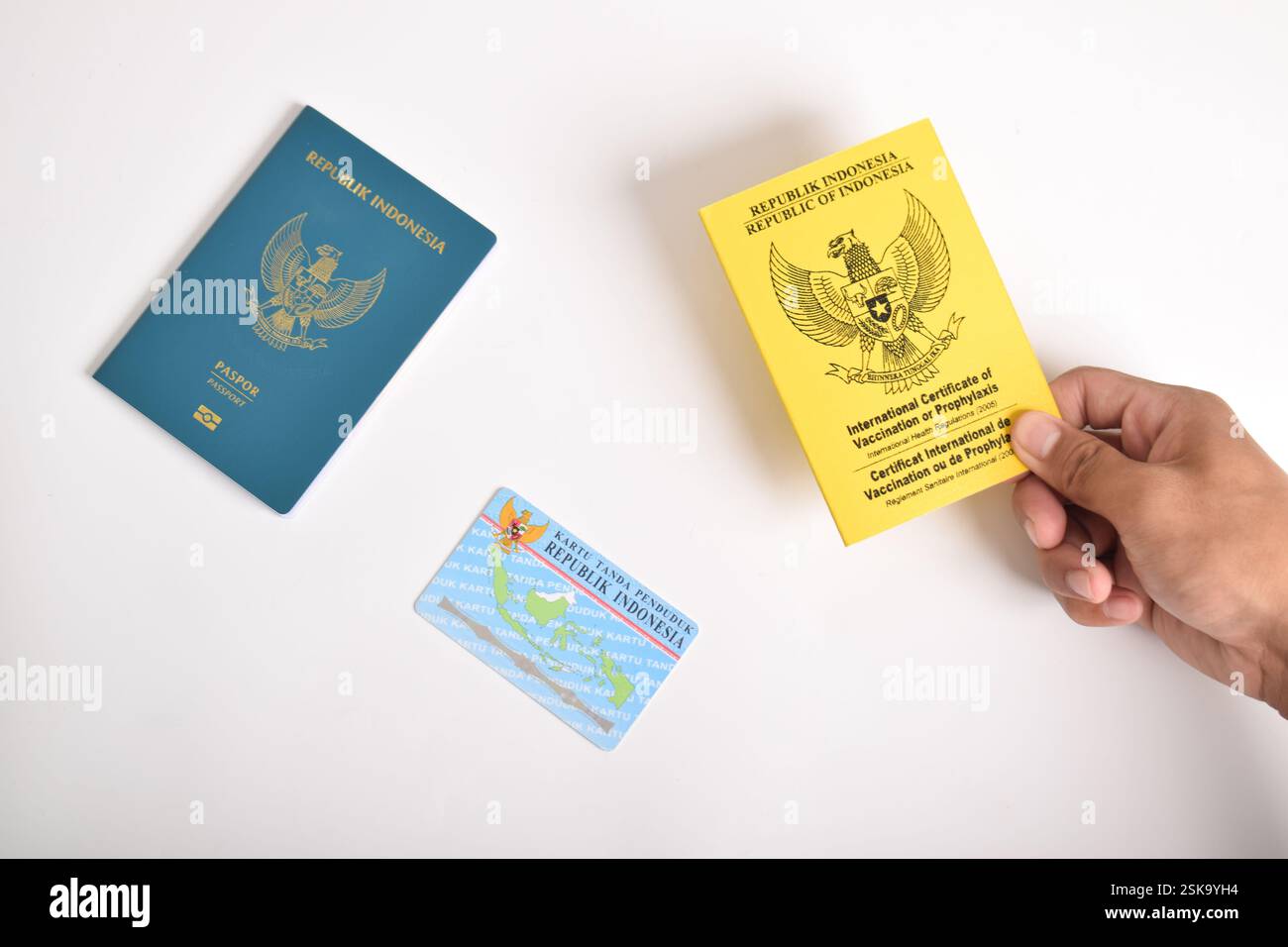 Pasuruan, Indonesia - February 9, 2025: Passport, KTP (Indonesian ...