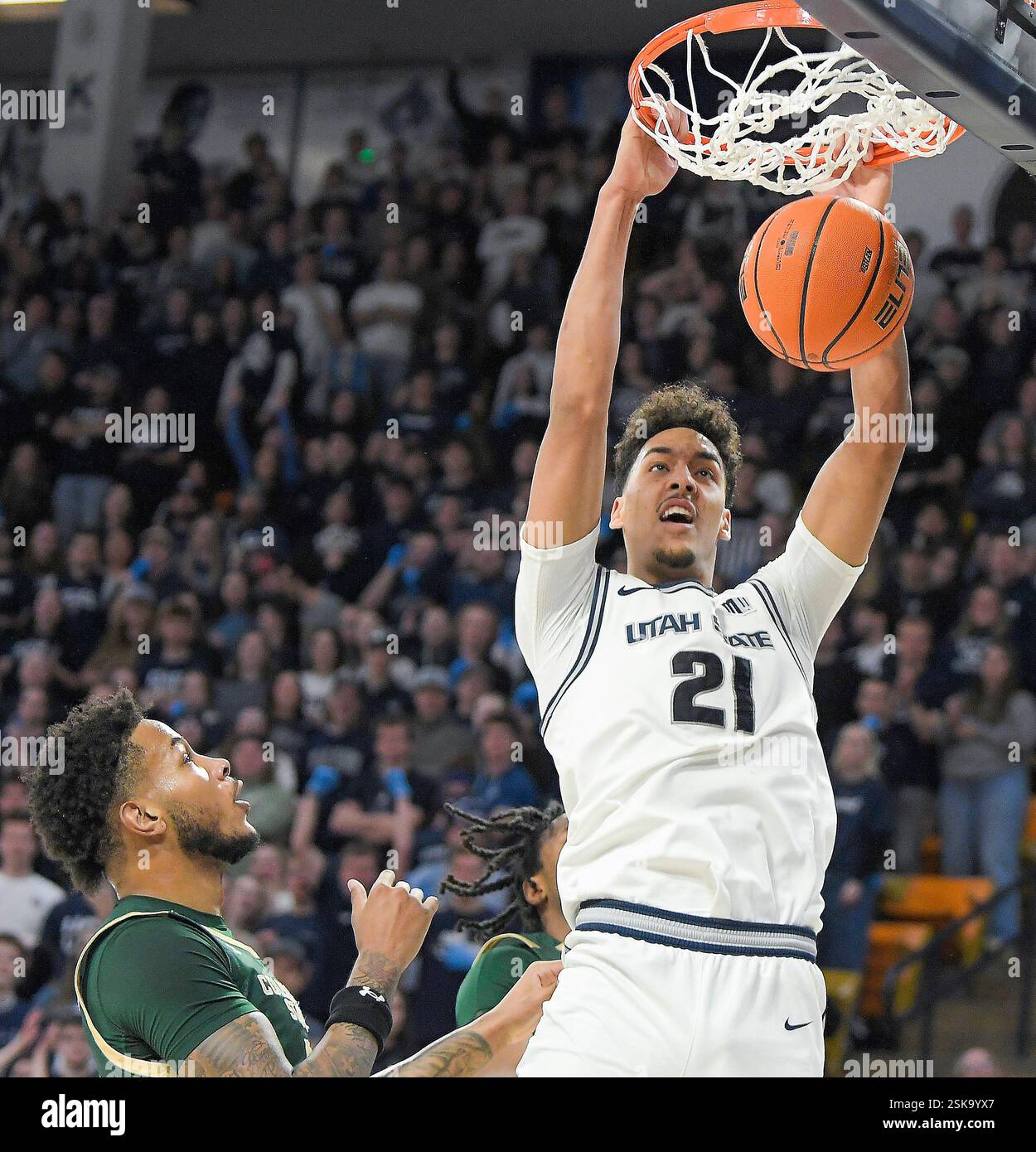 Utah State center Aubin Gateretse (21) dunks the ball as Colorado State ...