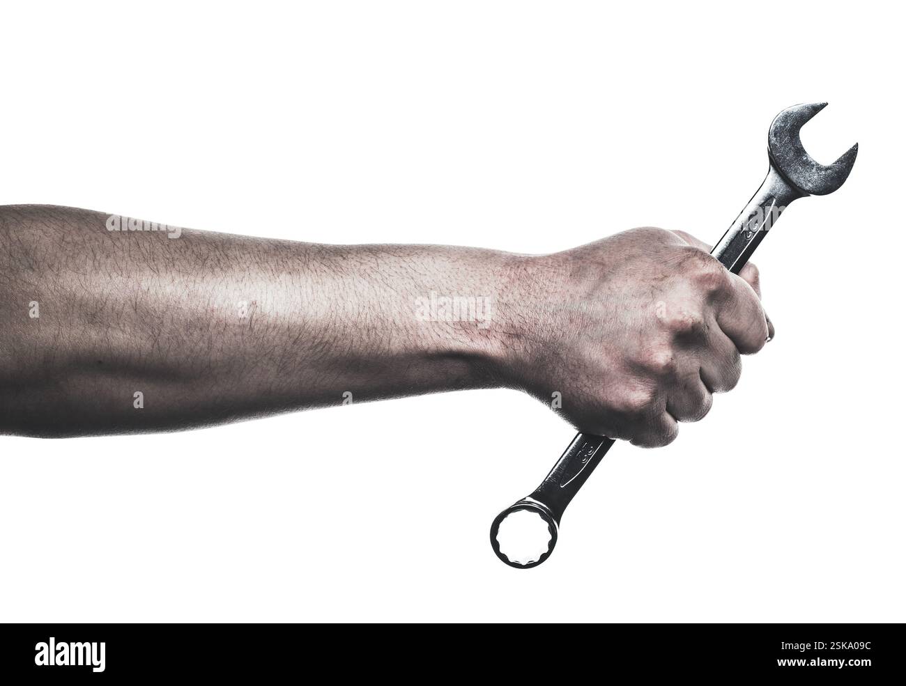 Hand gripping a wrench, showcasing strength and precision in mechanical ...