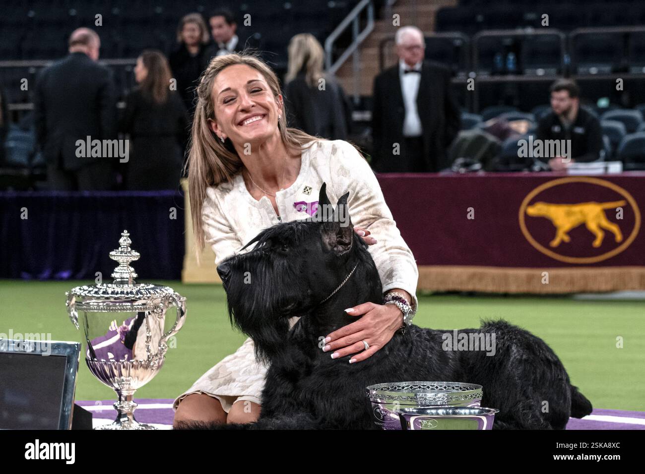 Monty, the Giant Schnauzer wins Best in Show with handler Kate Bernadin ...
