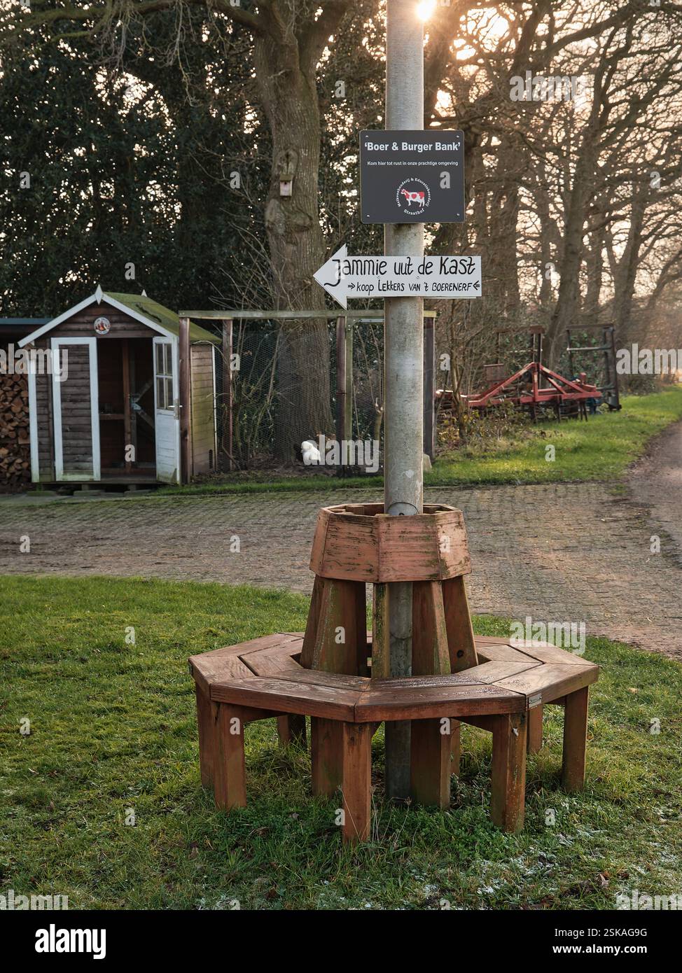 February 2, 2025 - Echten, Netherlands: A wooden bench surrounds a ...