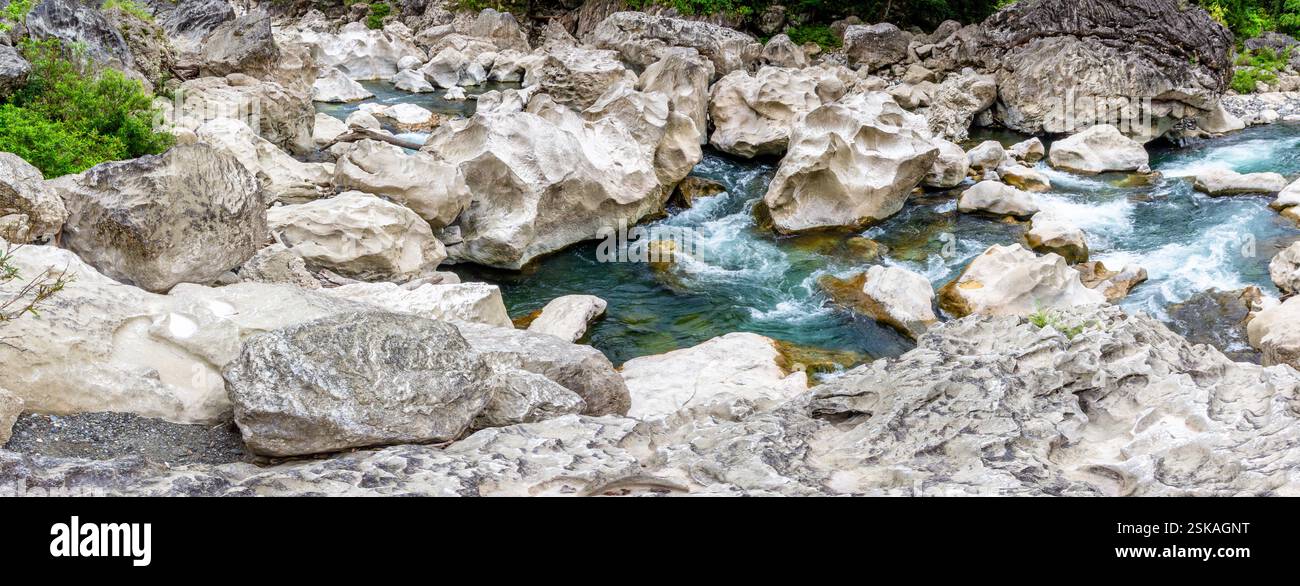 Stunning rock formations polished by the flowing current of Madalag ...