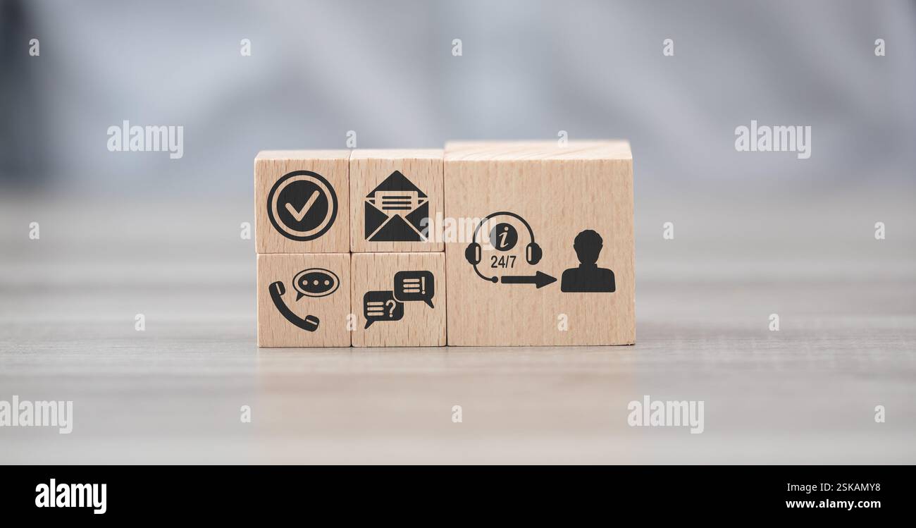 Wooden blocks with symbol of customer service concept Stock Photo - Alamy