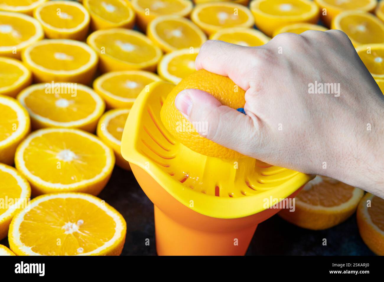 Squeezing juice from grapefruit close hi-res stock photography and ...