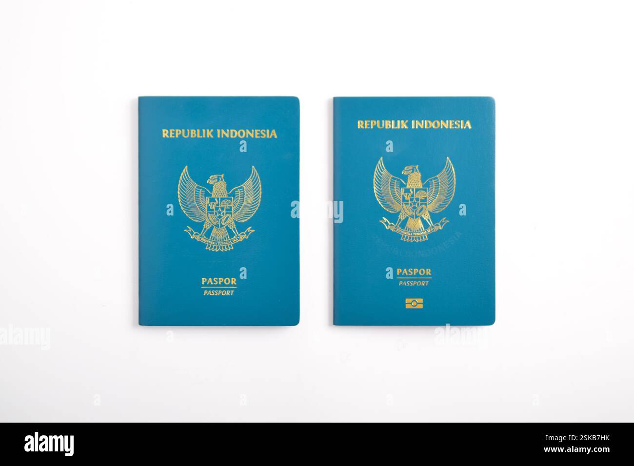 Indonesian electronic passport and regular passport isolated on white ...